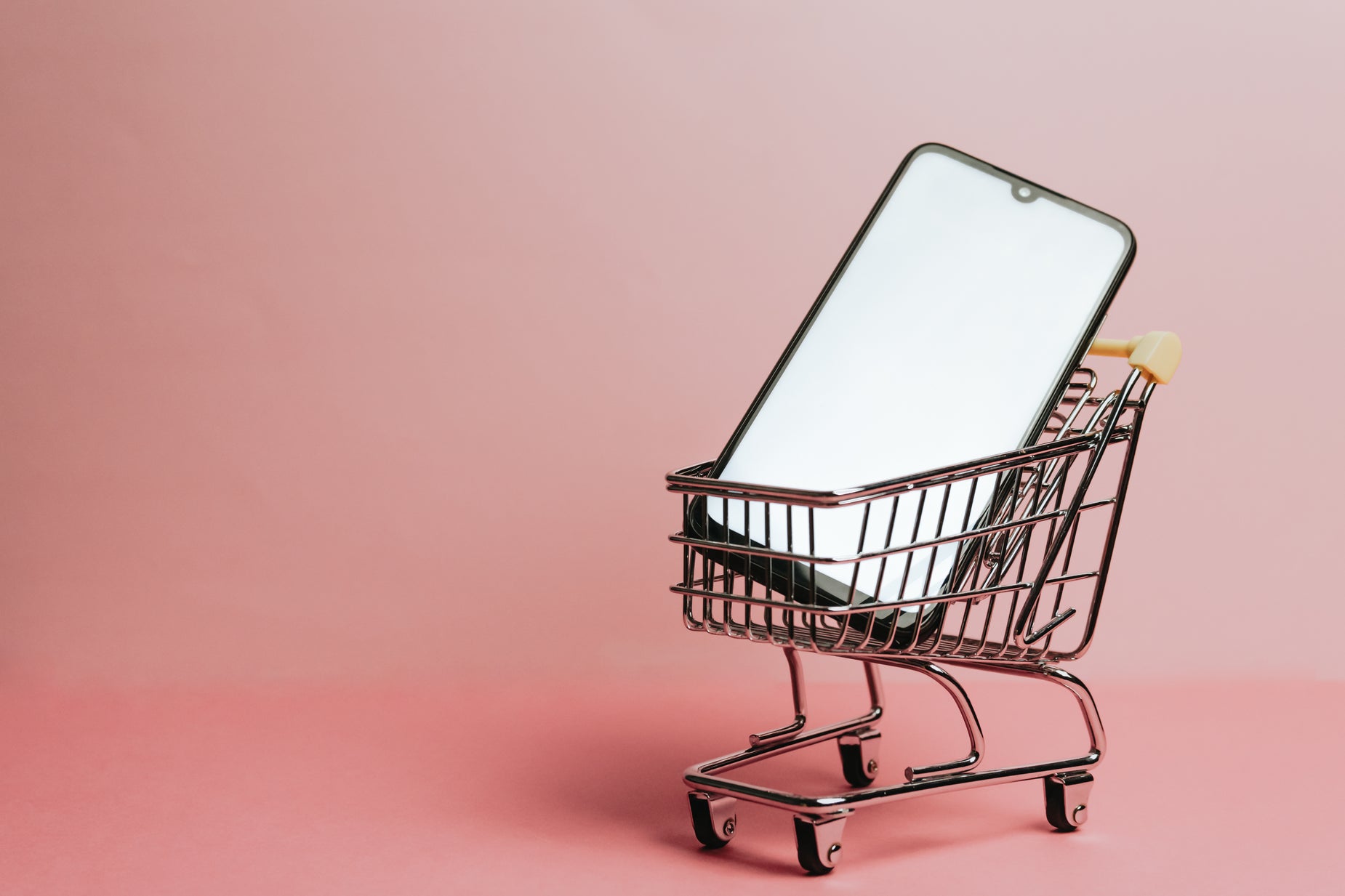 Browse Free HD Images Of Cell Phone Sits In A Small Shopping Cart browse-free-hd-images-of-cell-phone-sits-in-a-small-shopping-cart